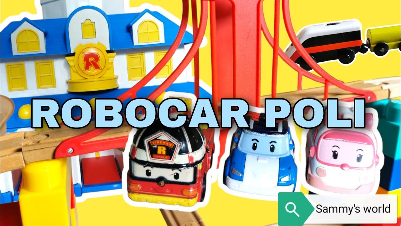 Robocar Poli station surrounded by wooden train track and megabloks ...