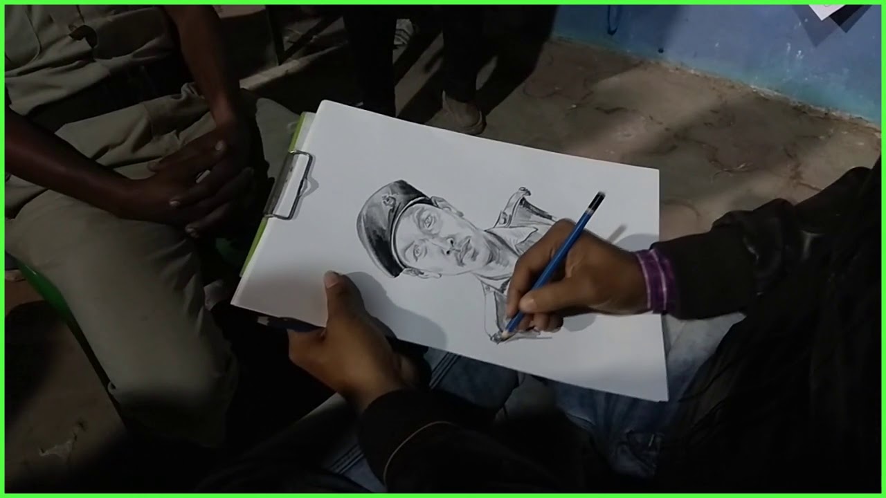 Live portrait drawing of a police at Kolkata book fair,IT'S AMAZING ...