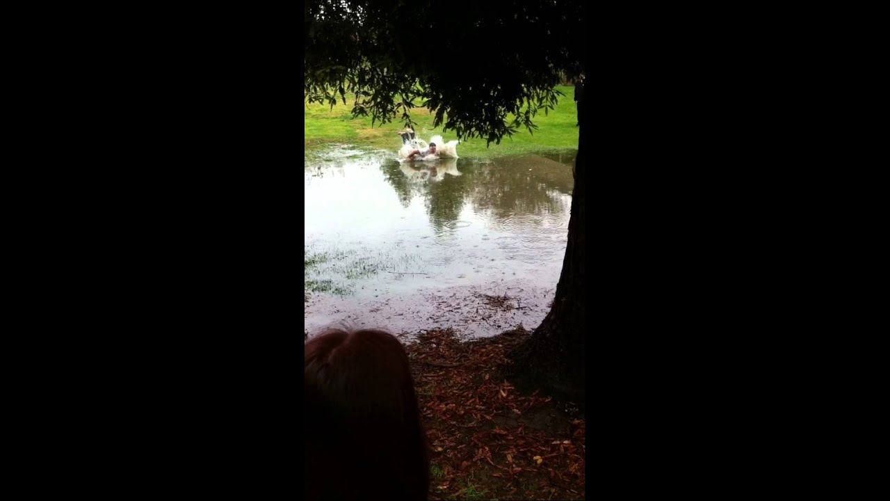 crazy guy jumps into a huge puddle at school - YouTube