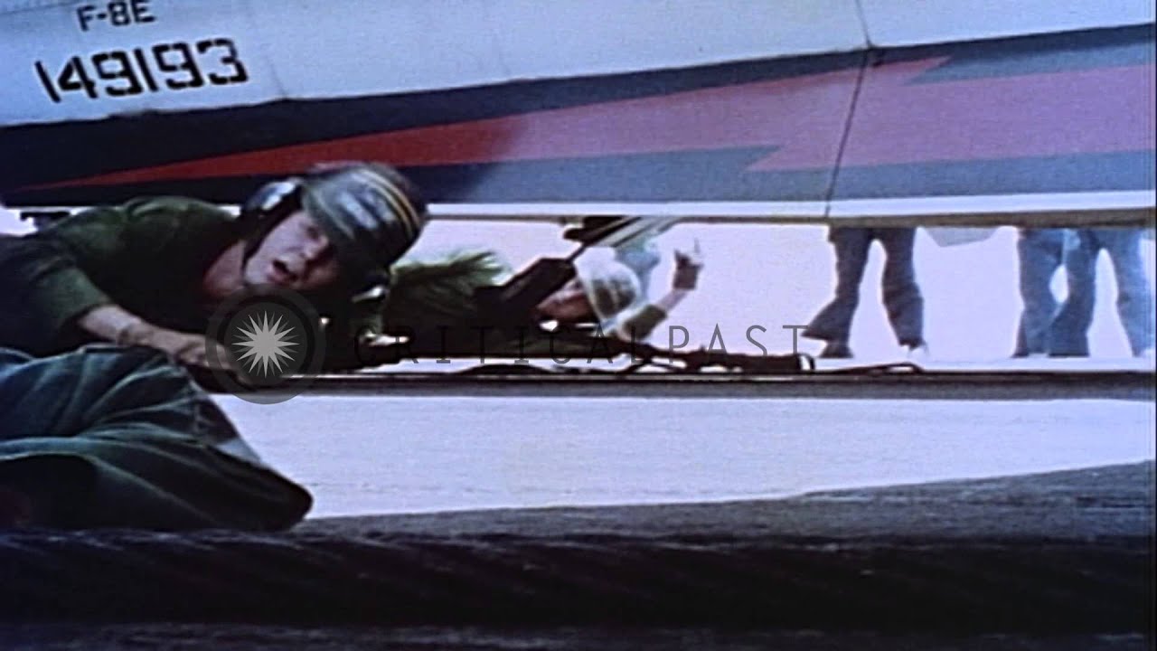 Launch of US Navy jet fighters using aircraft catapults from deck of ...
