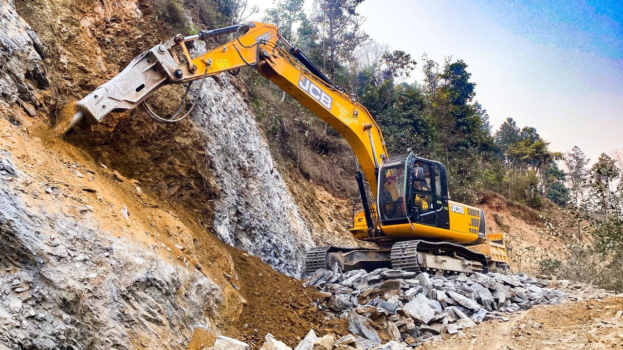 Excavator With Hydraulic Hammer Breaking Rock | JCB Stone Breaker ...