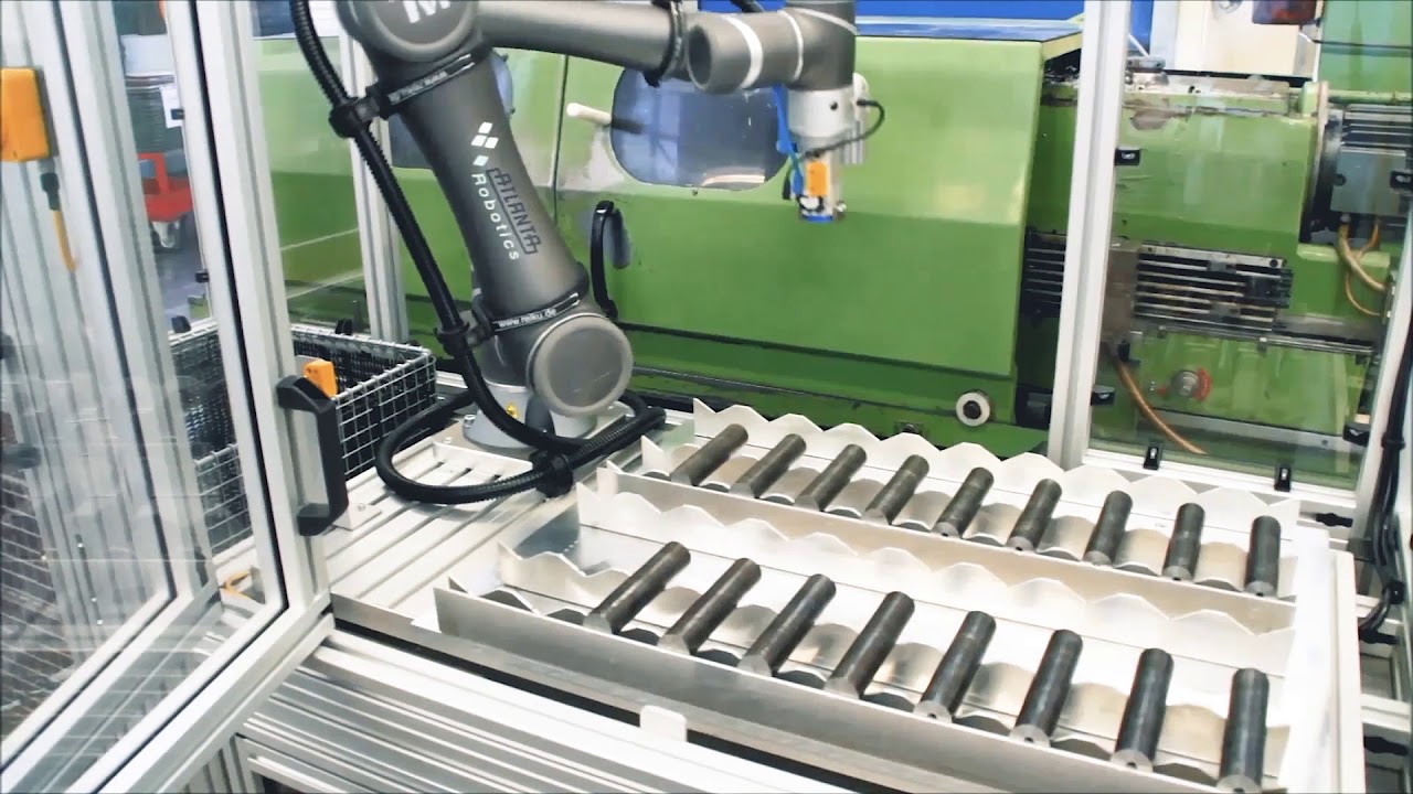 V2A006 TM Robot - CNC Metal Processing - YouTube