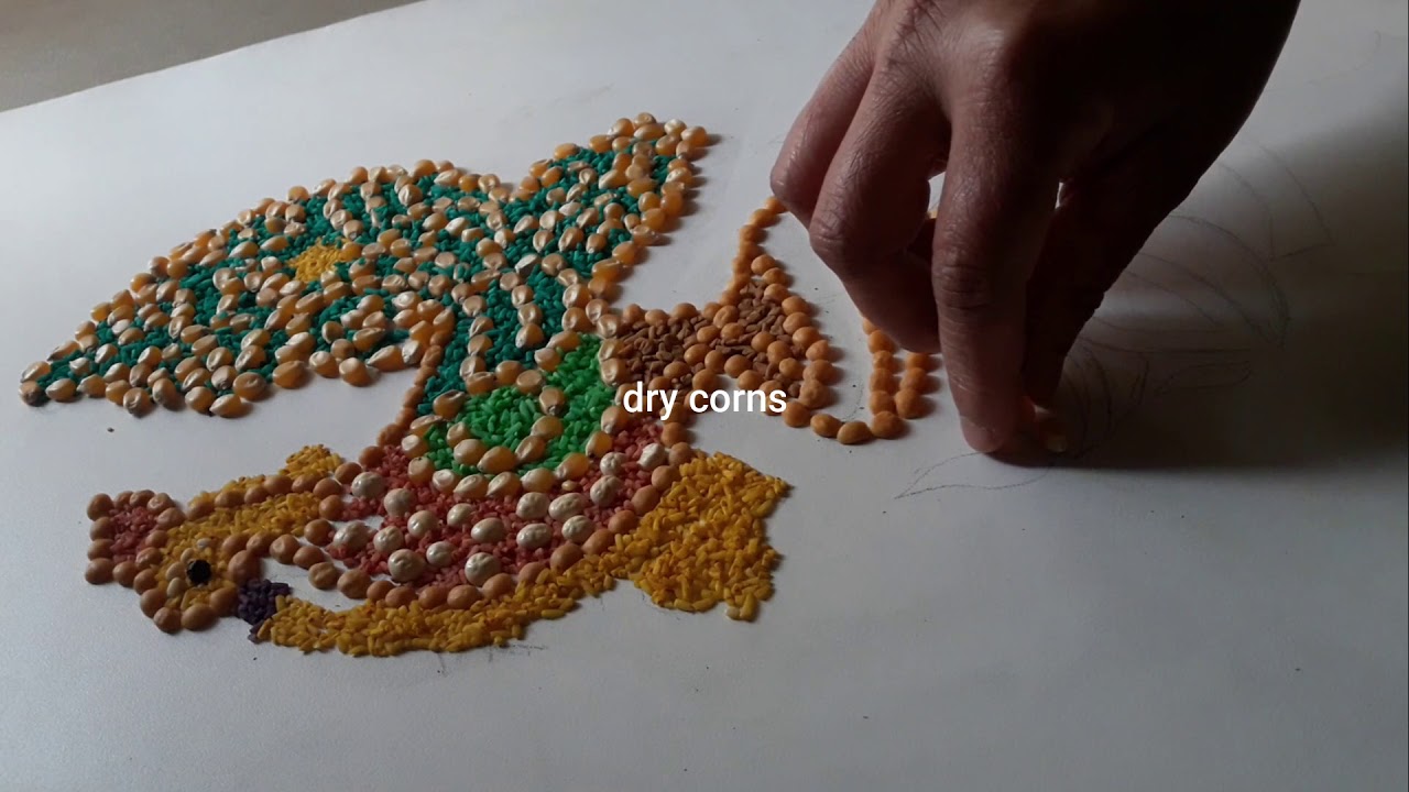 Rangoli With dal and colored rice - YouTube