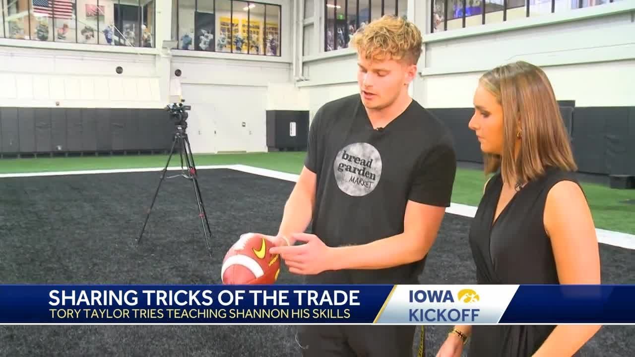 Tory Taylor teaches KCCI's Shannon Ehrhardt how to punt - YouTube