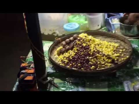 Ordering Street food at Bus Station in Yagon, Myanmar