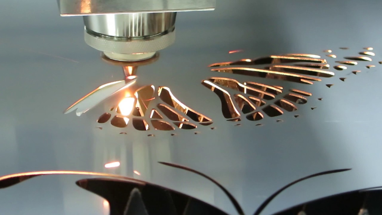 LightObject 700W fiber laser cutting butterfly on 1mm stainless steel ...