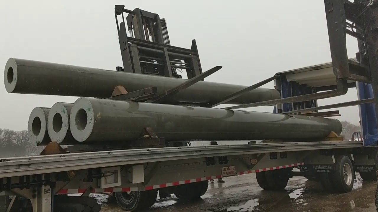 Loading Musco Poles on Flatbed Trailer - YouTube