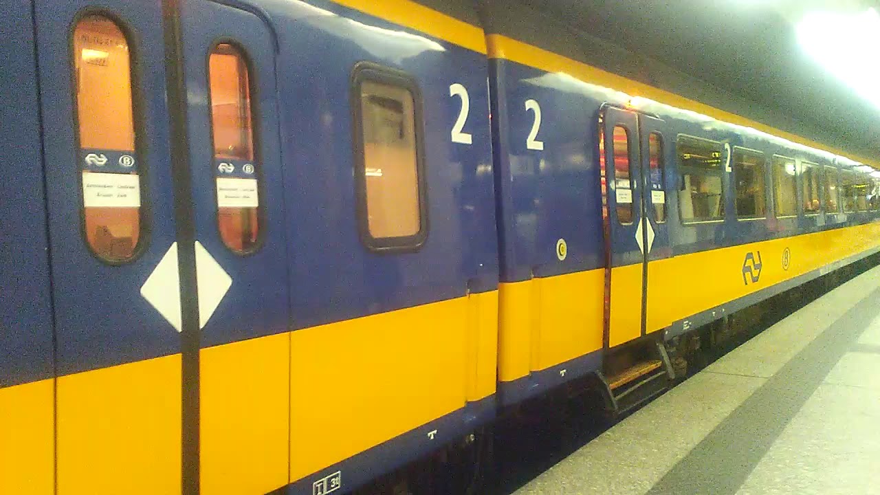 NS ICRm + SNCB/NMBS Traxx leaving Brussels Central Station - YouTube