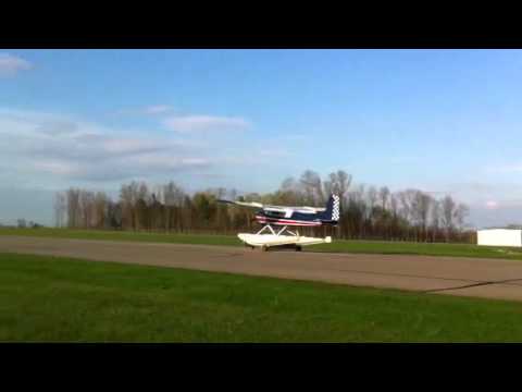 Cessna 180 floatplane dolly takeoff - YouTube