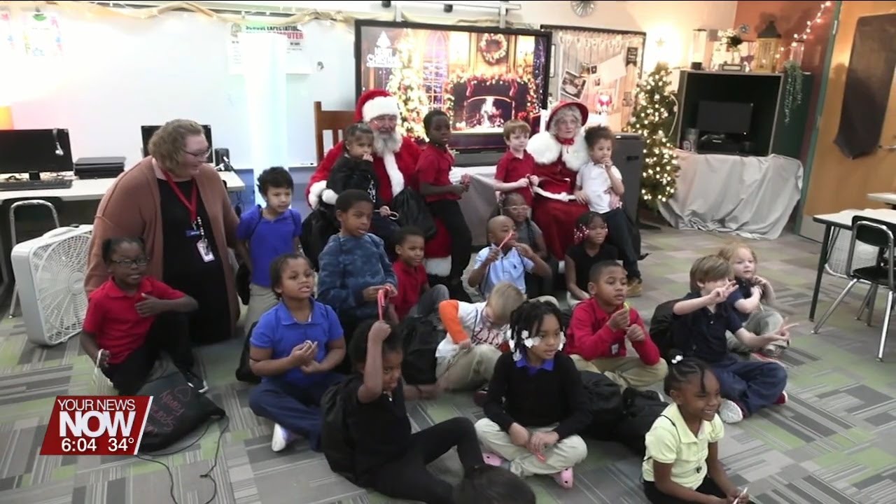 Santa and Mrs. Claus make a stop at Unity Elementary to pass out gifts ...