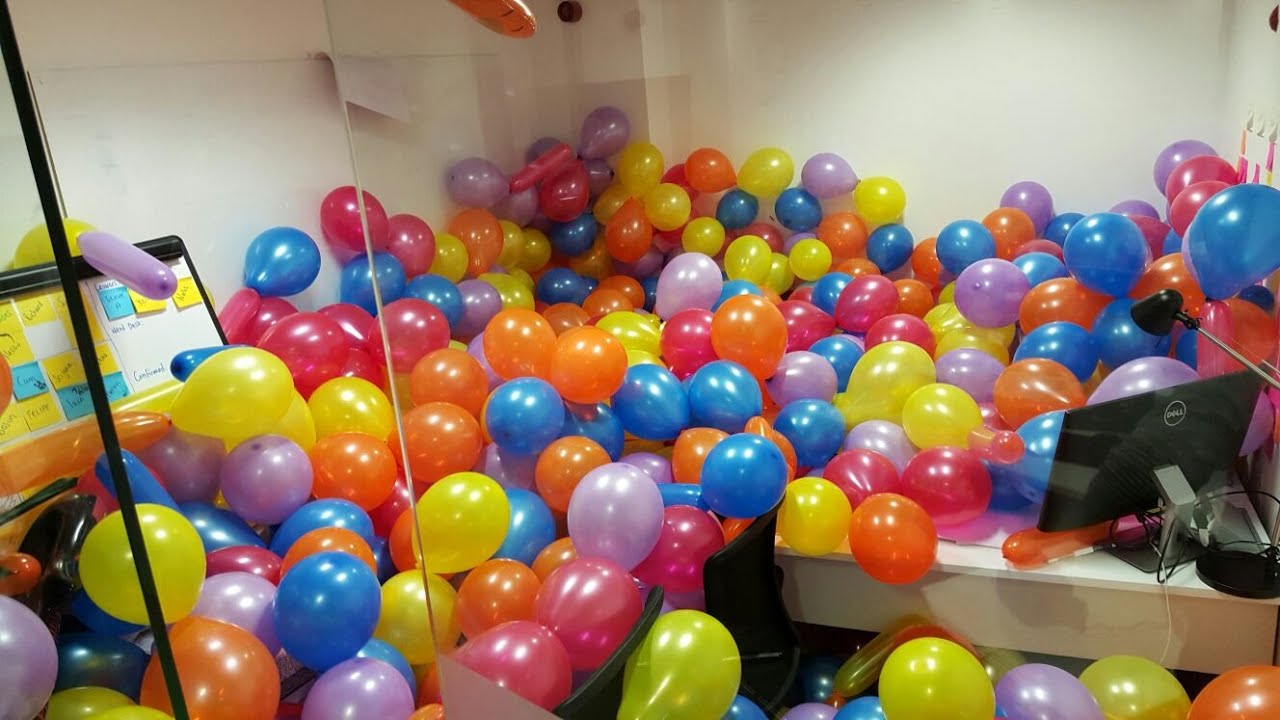 Timelapse of filling an office with balloons - YouTube