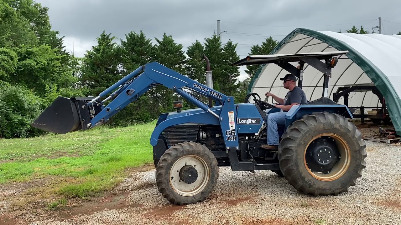 Long 680 4x4 Tractor w/ Loader - YouTube