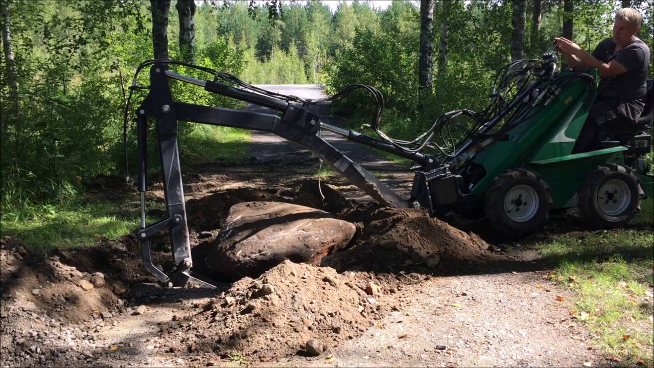 Avant 313 + homemade backhoe - YouTube