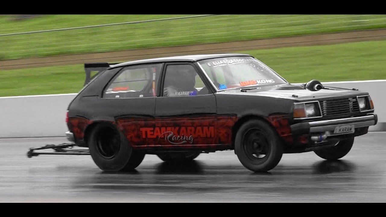 INSANE RB30 POWERED MAZDA 323 TEAM KARAM RACING 8.19 @ 164 MPH - YouTube