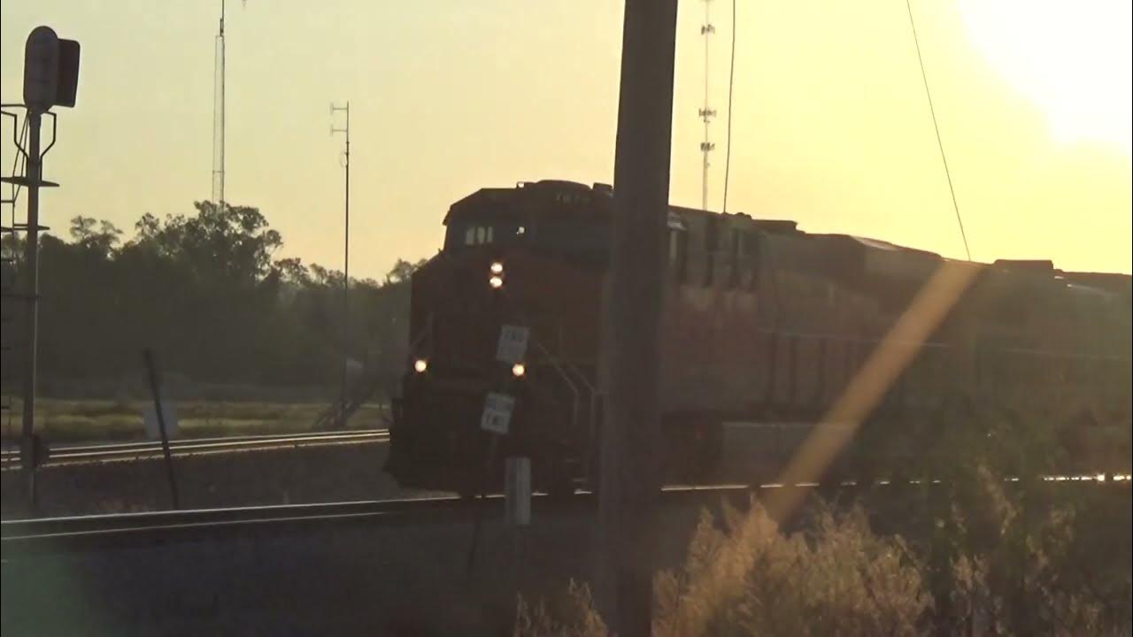 BNSF 7879 leads a grain train off the Napier Sub at Pacific Junction, Iowa. - YouTube