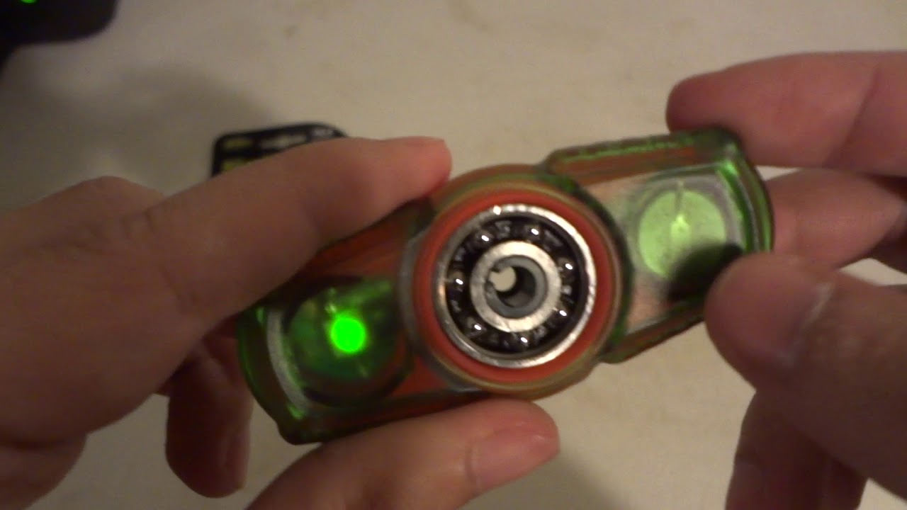 UNBOXiNG REViEW OF ZiNG SPiNZiPZ RED AND GREEN LED Fidget Spinner - YouTube