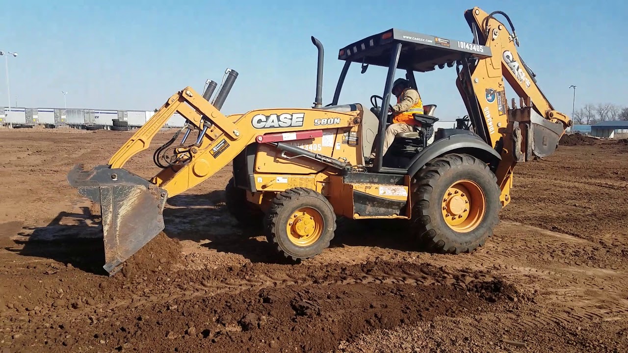 Backhoe dig/backfill - YouTube