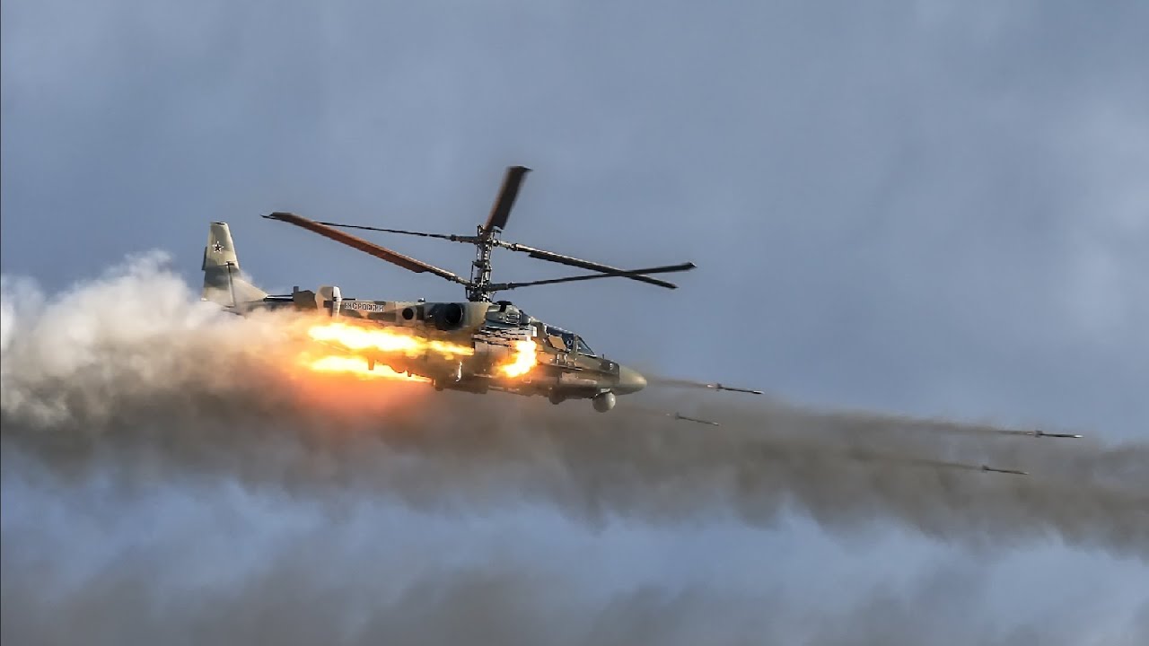 Russian Kamov Ka-52 Alligator Helicopters Fire Rockets And Cannons ...