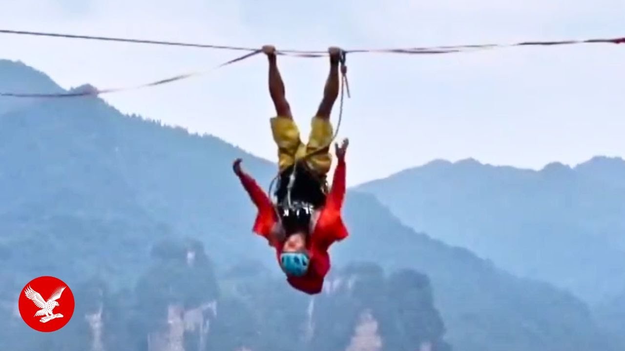 World's best slackliners compete 1300ft above mountain gorge - YouTube