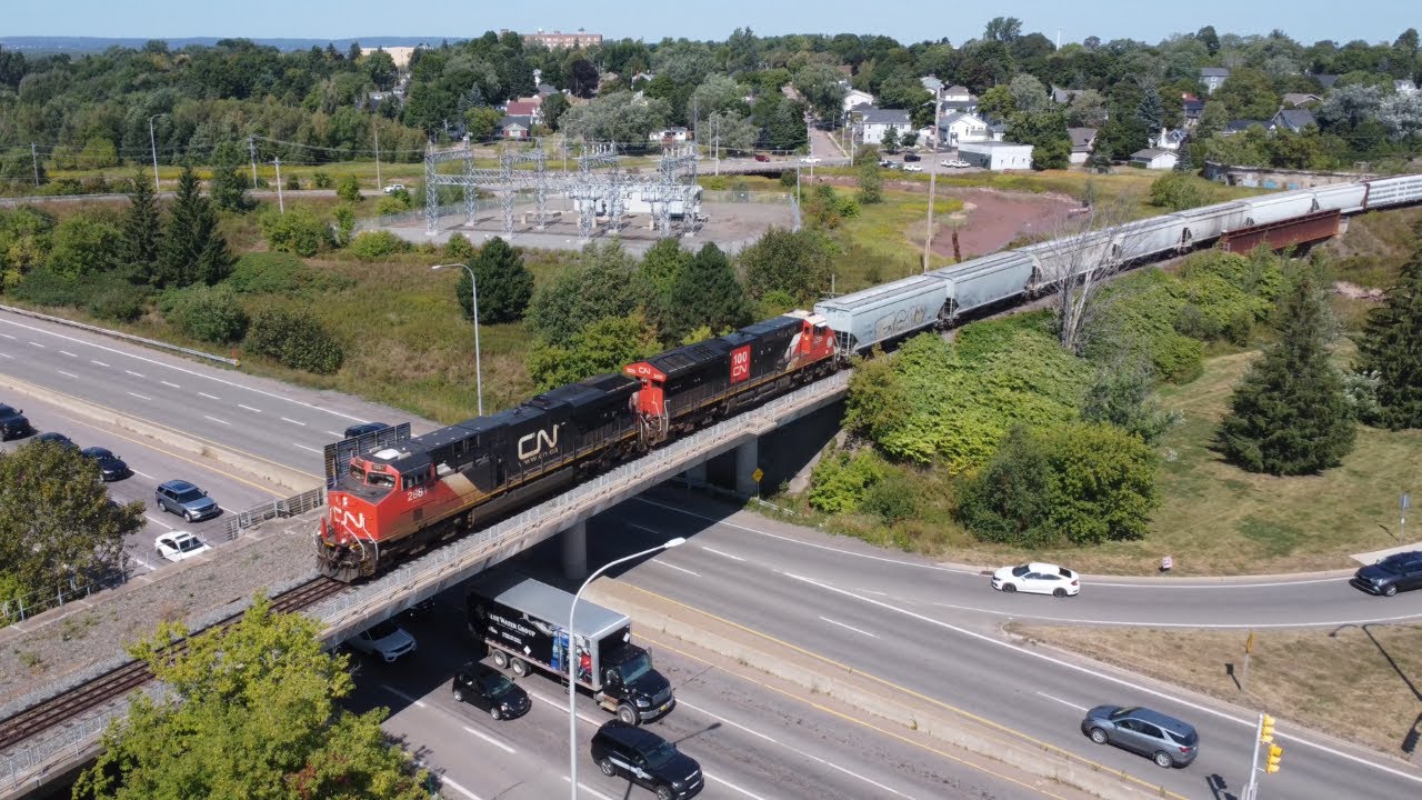Awesome Aerial 4K View! Long manifest Train CN 507 Rolling into Moncton ...