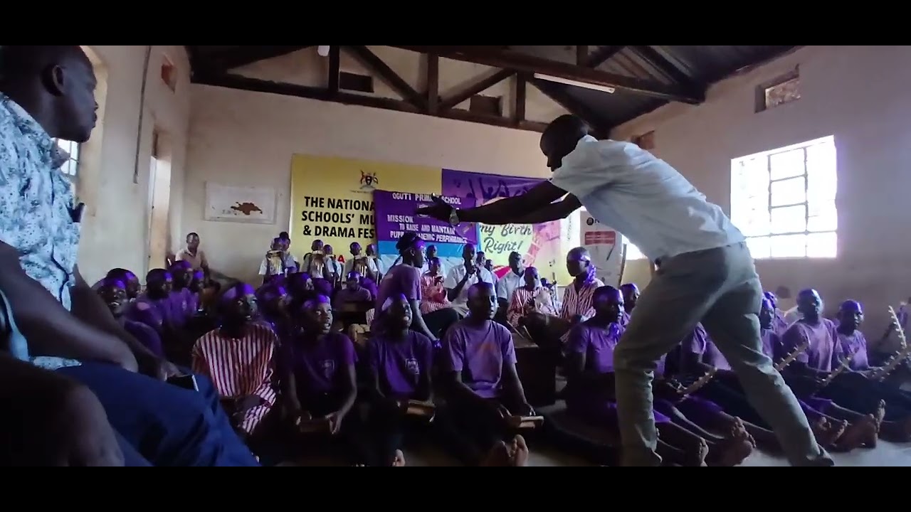 Oguti P/S Tororo performing during the nation primary music festival in ...