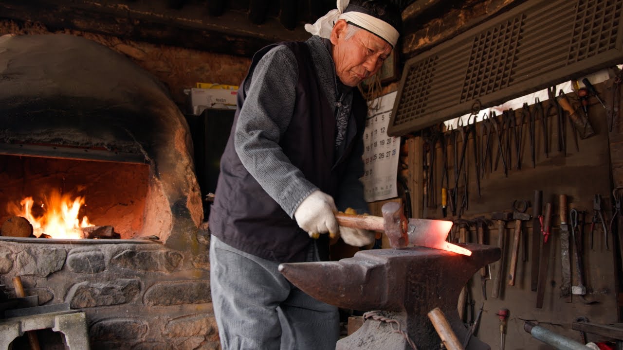 Cast iron knives made in a Korean traditional blacksmith shop in the ...
