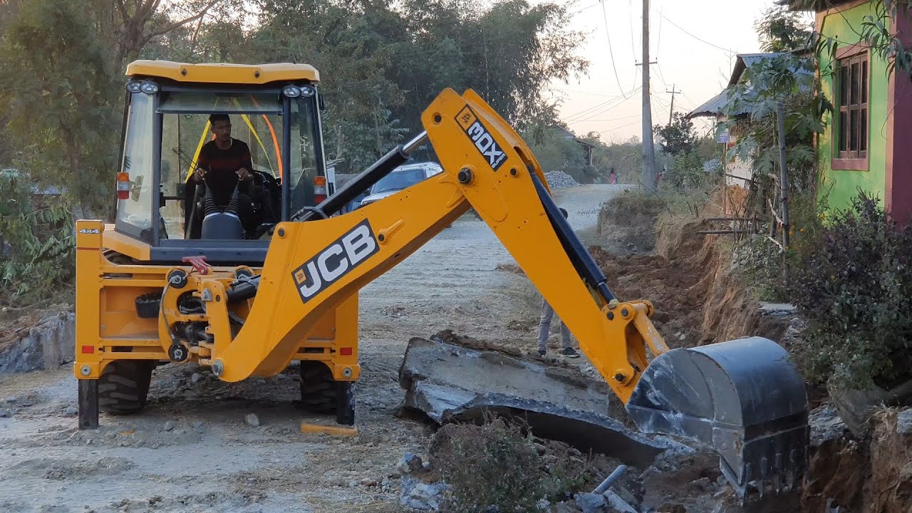 JCB Backhoe Showing it's Power - JCB Breaking and Lifting Heavy ...