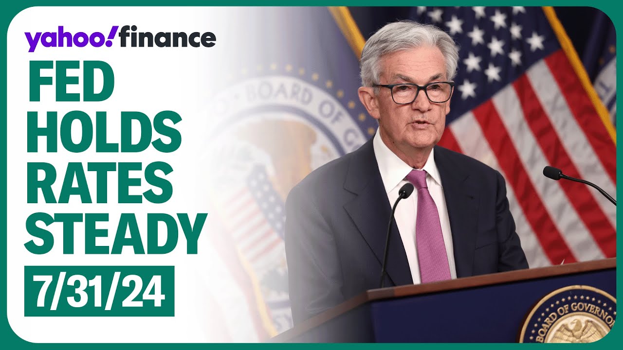Fed leaves rates unchanged, hints at possibility of future cut - YouTube