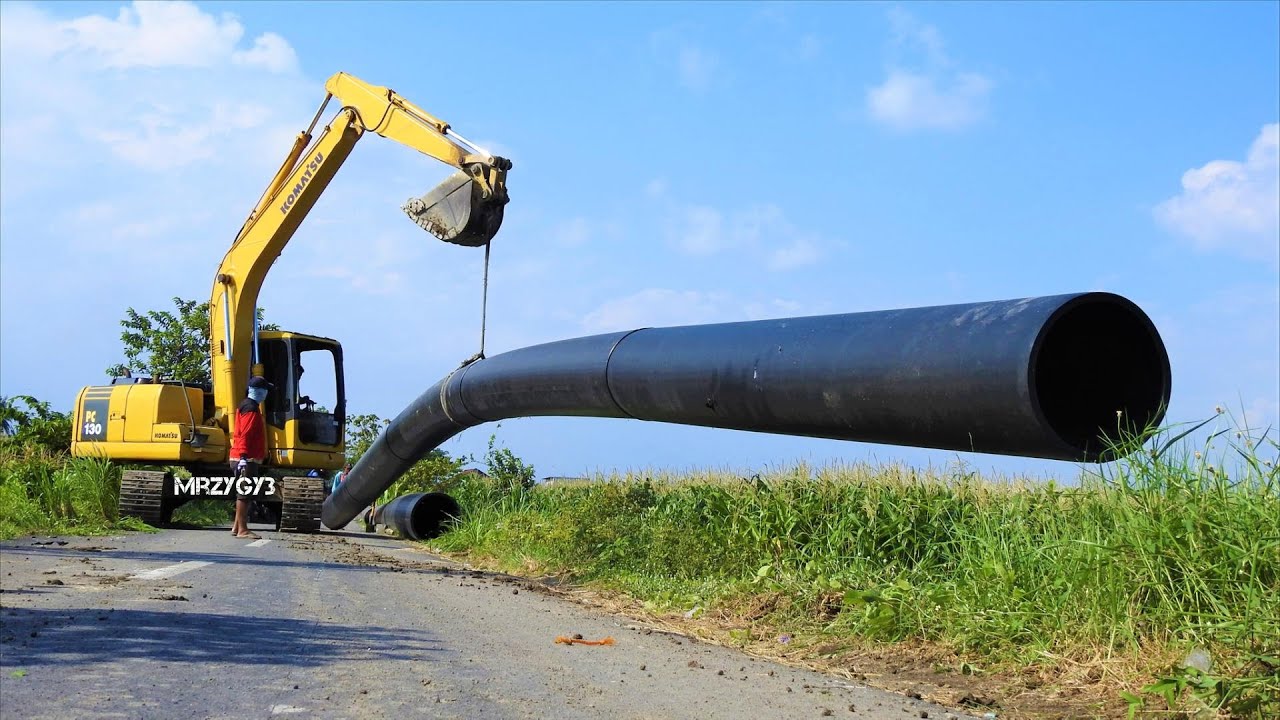 Excavator Digging Installing Pipeline For The Waste Water Treatment ...