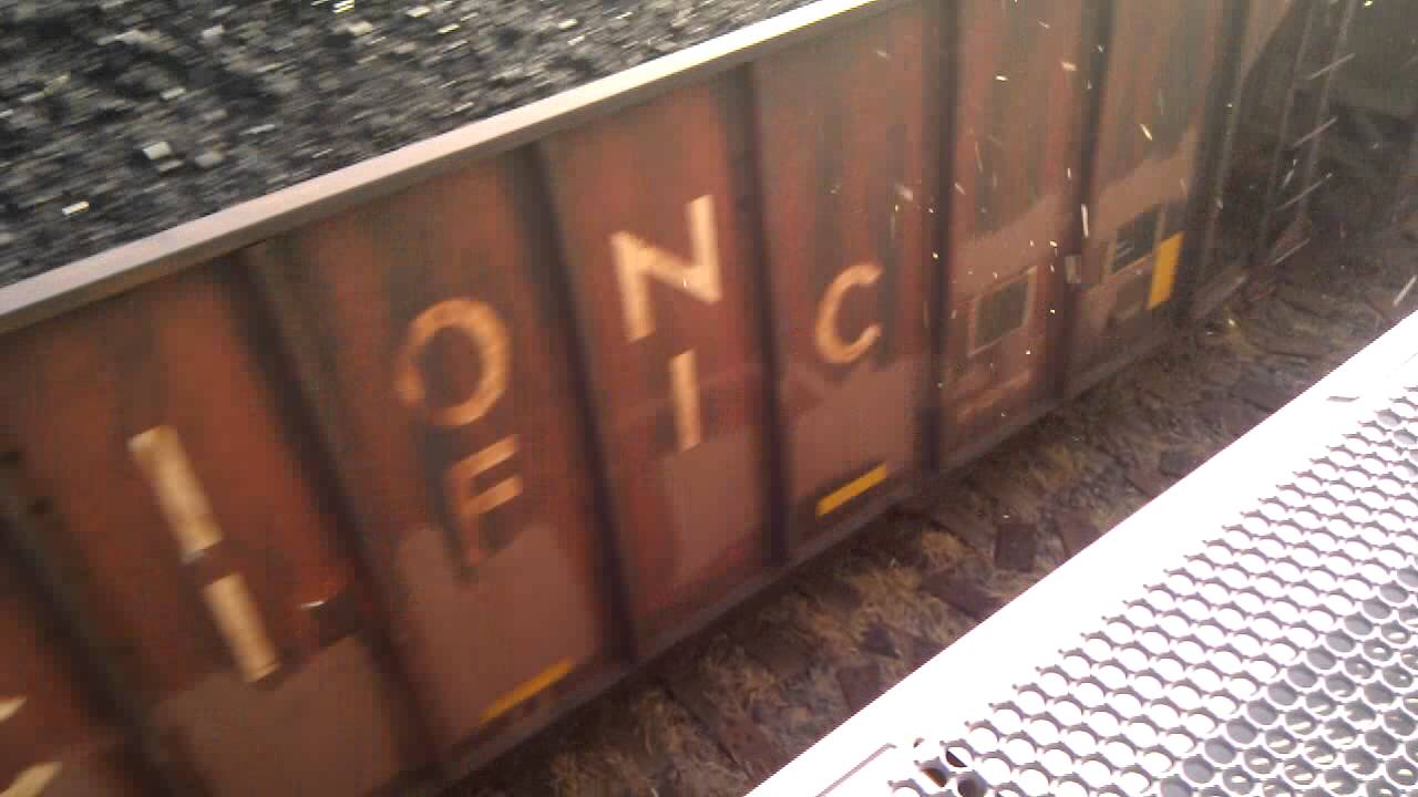 Loading rail cars while watching coal cars - YouTube