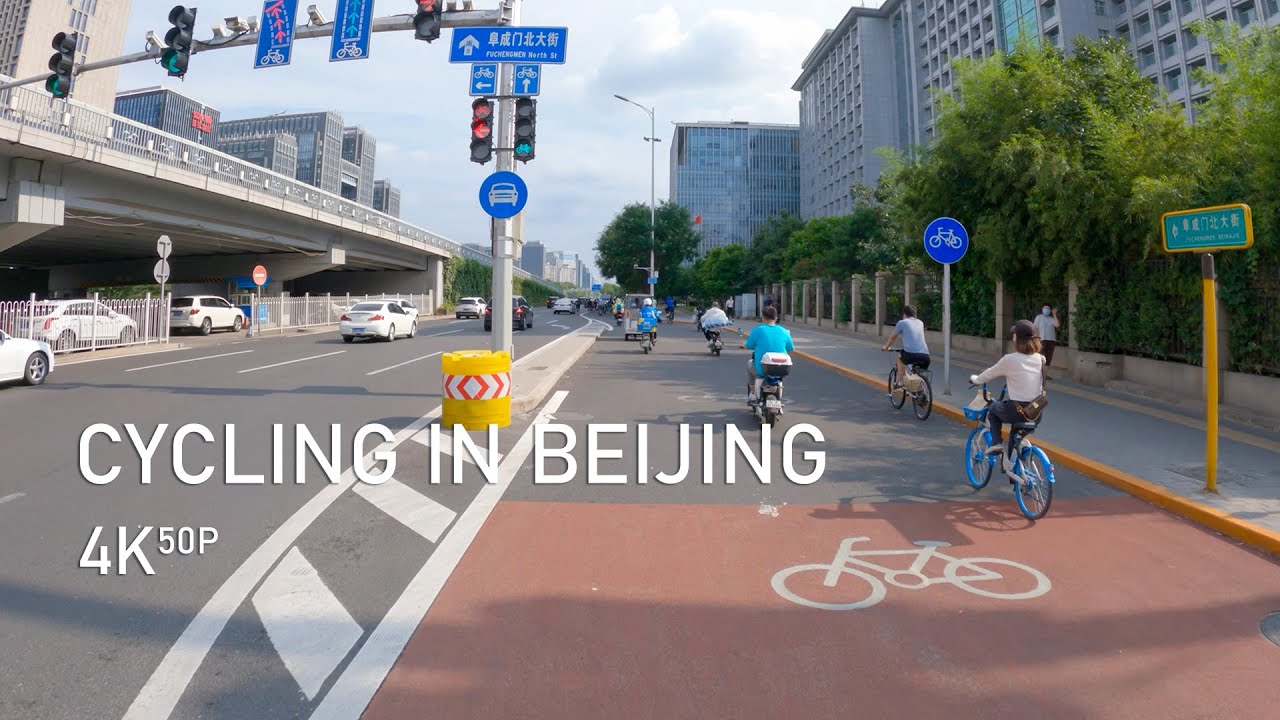 Cycling in a circle counterclockwise on the Second Ring Road in Beijing ...