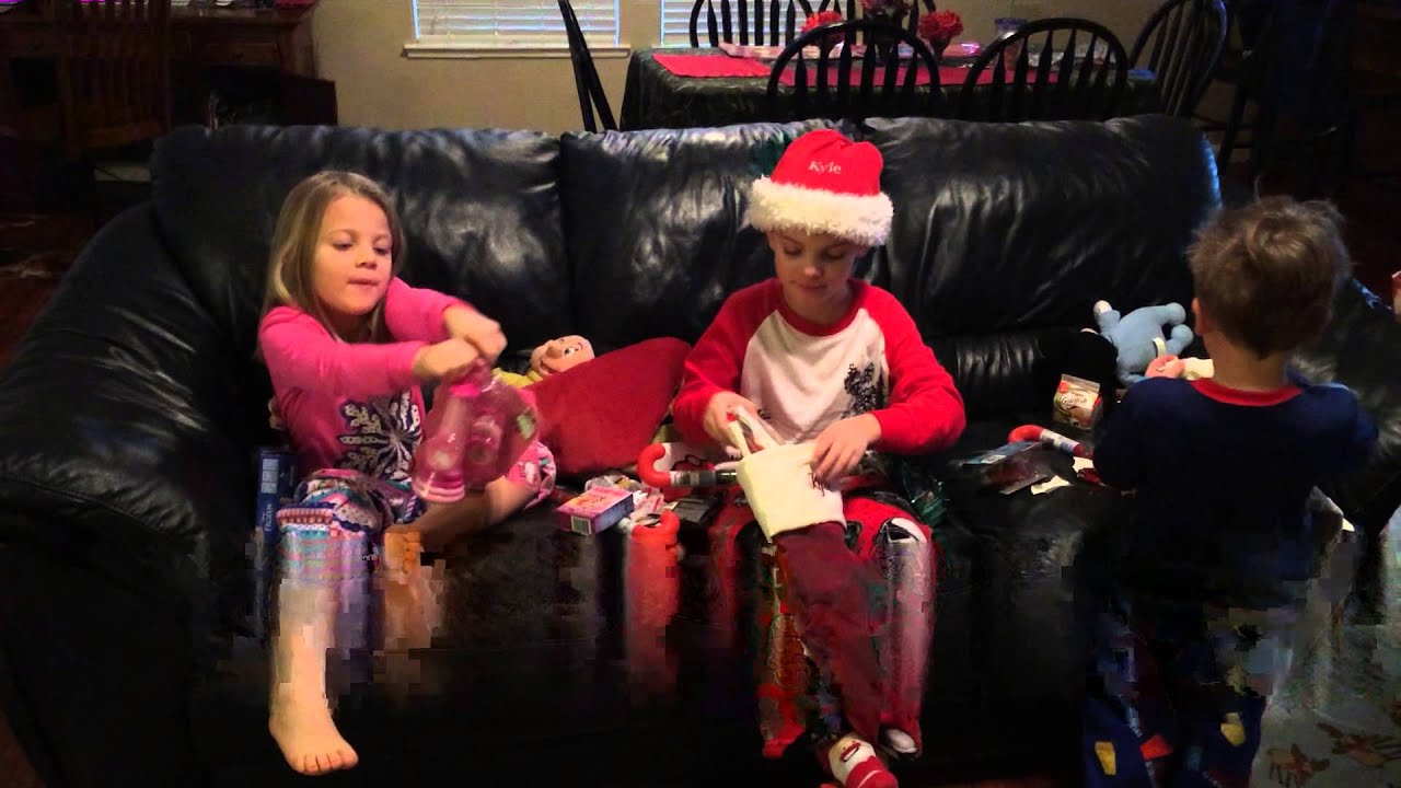 The kids opening their stockings! - YouTube