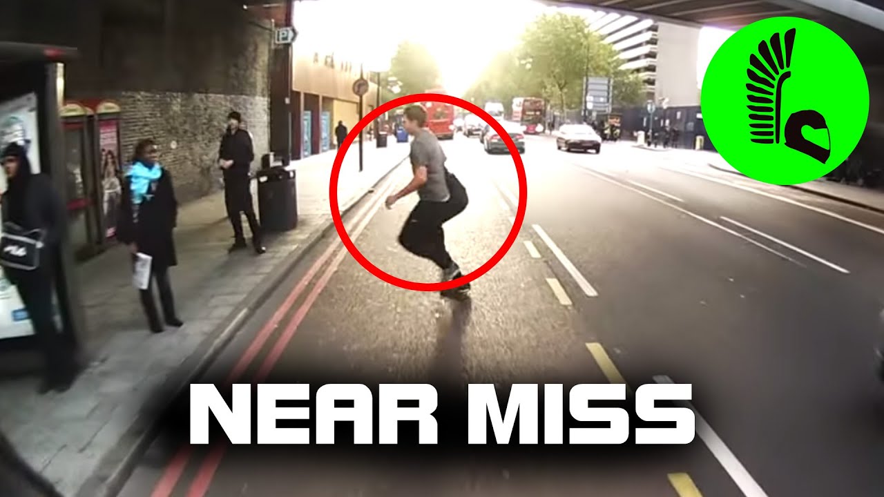 close call - pedestrian runs through traffic blindly!!! - YouTube