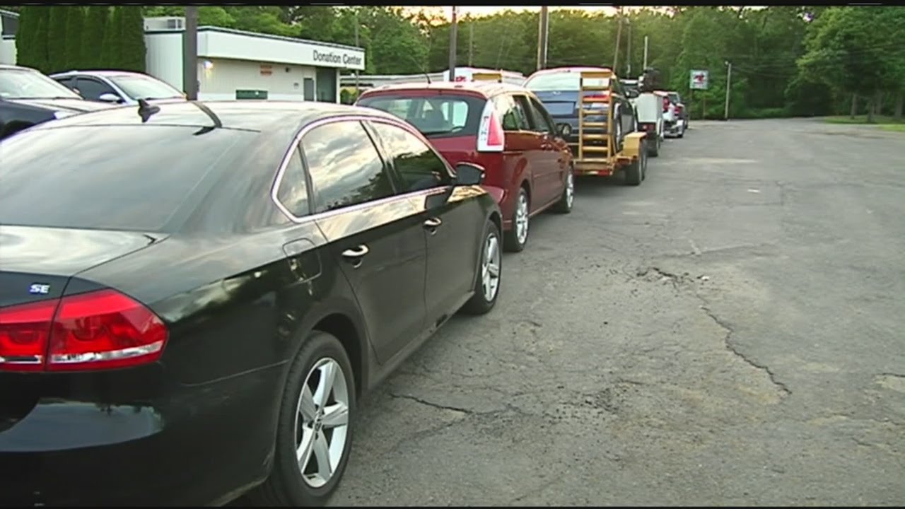 Cars line up for salvage inspection in Westfield - YouTube
