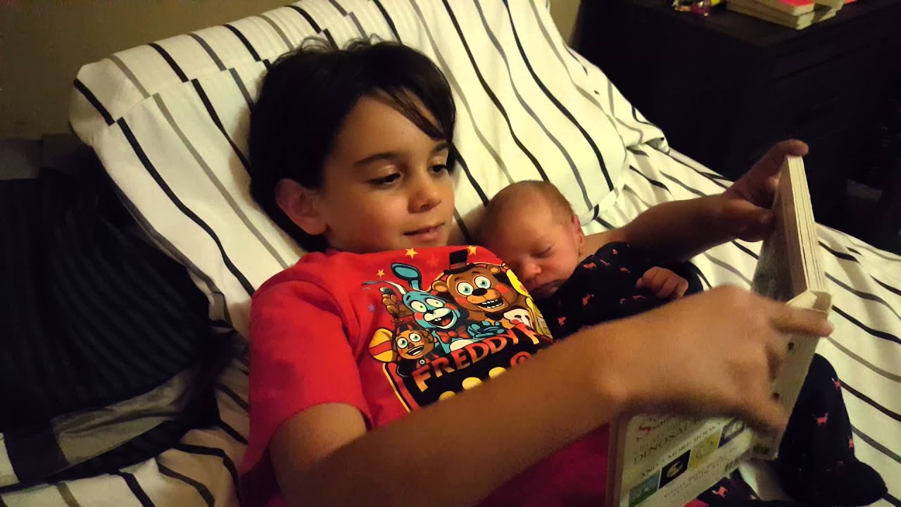 Michael reading to Colin before bedtime. - YouTube