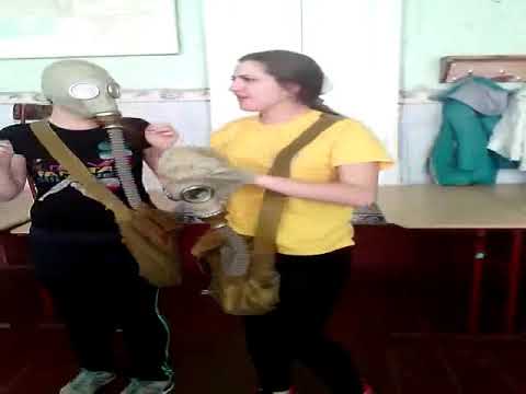 girls donning gas mask - YouTube