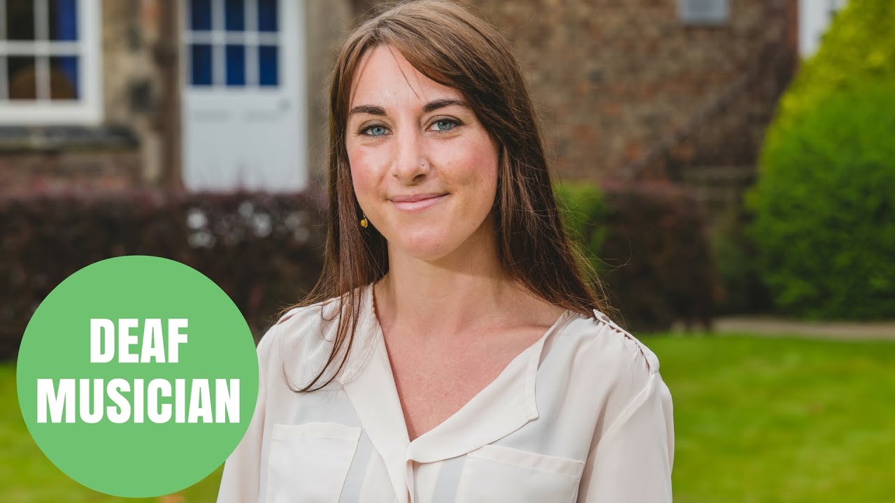 Woman born with profound deafness becomes talented musician - YouTube