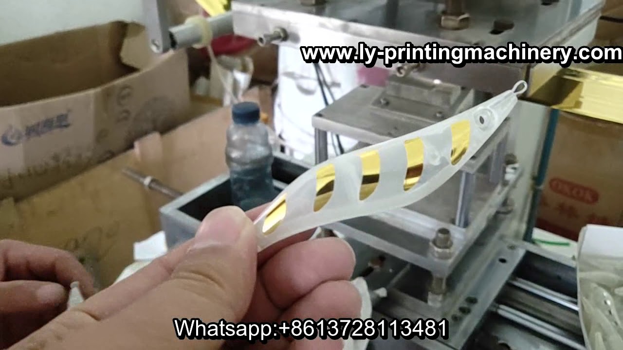 Hot stamping machine for fishing metal jig - YouTube