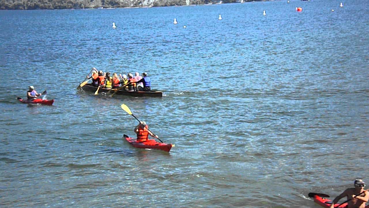 War Canoe and Kayaks on Okanagan Lake - YouTube
