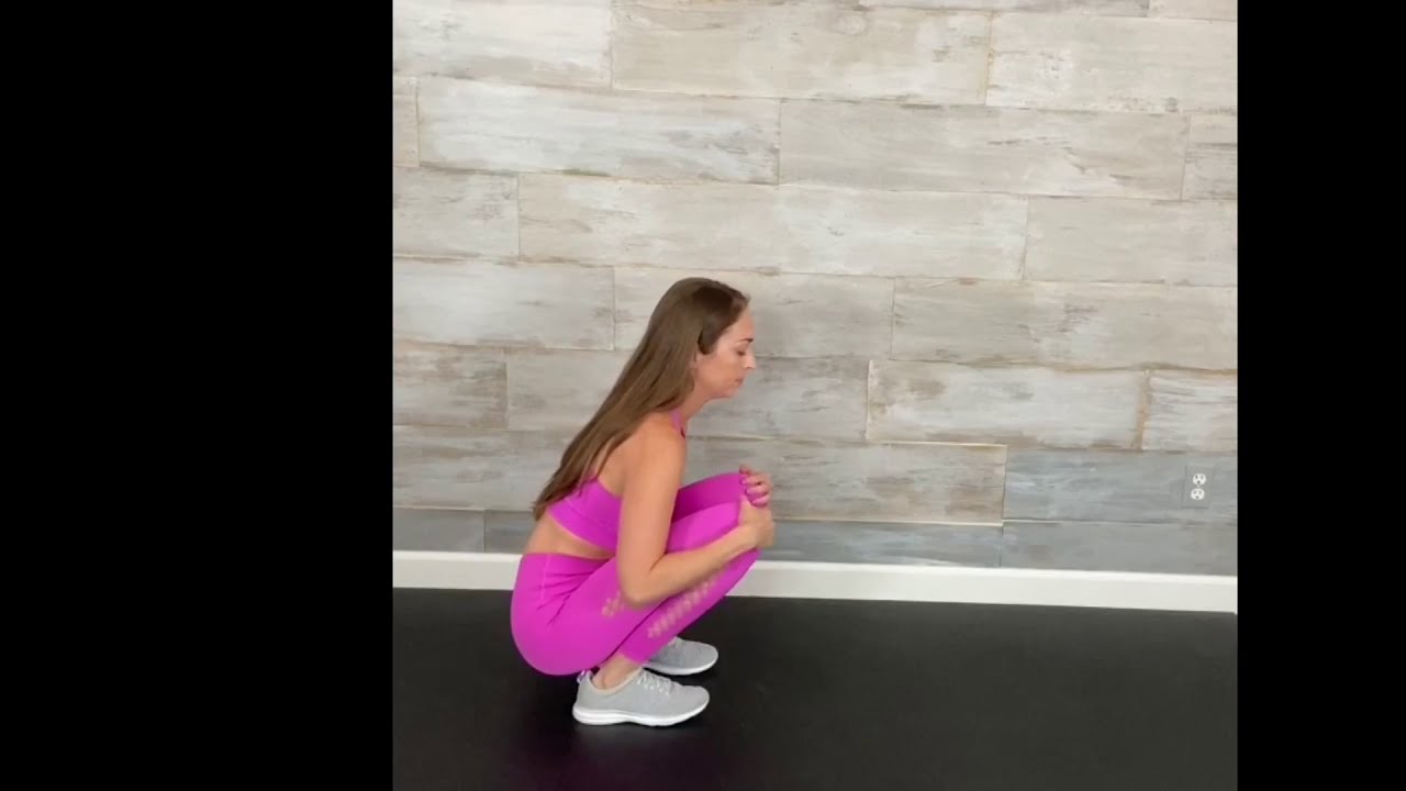 Deep squat knee hug rocks - YouTube