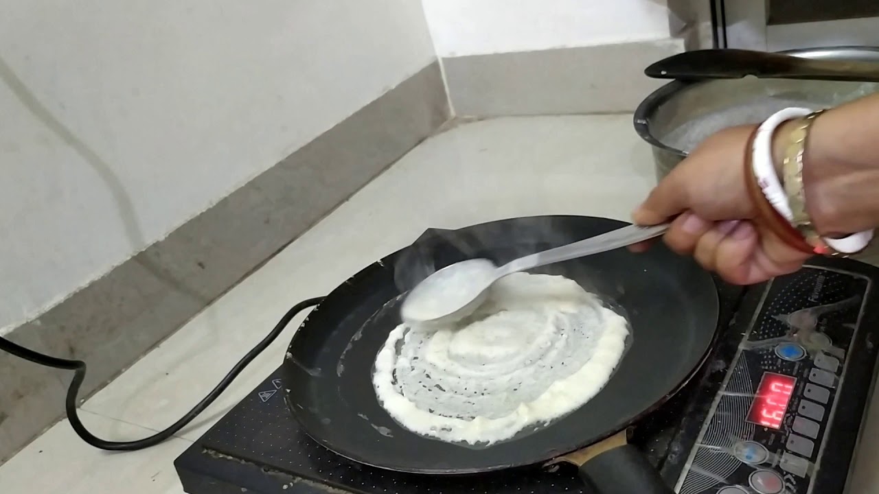 Non oily dosa making in induction - YouTube