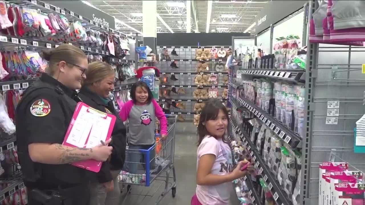 Oglala Sioux Tribal police shop with children - YouTube
