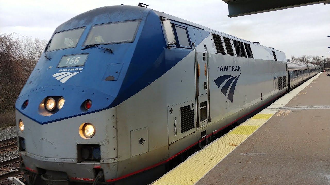 AMTK 166 leading Amtrak 63 arriving in Syracuse, NY - YouTube