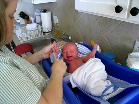 Connor's first sponge bath ... - YouTube