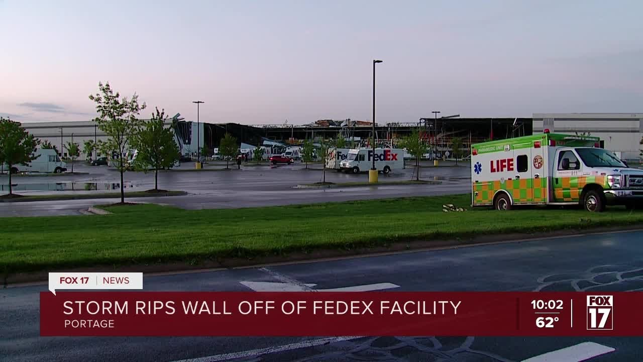 Storms rip off wall of FedEx facility in West Michigan - YouTube