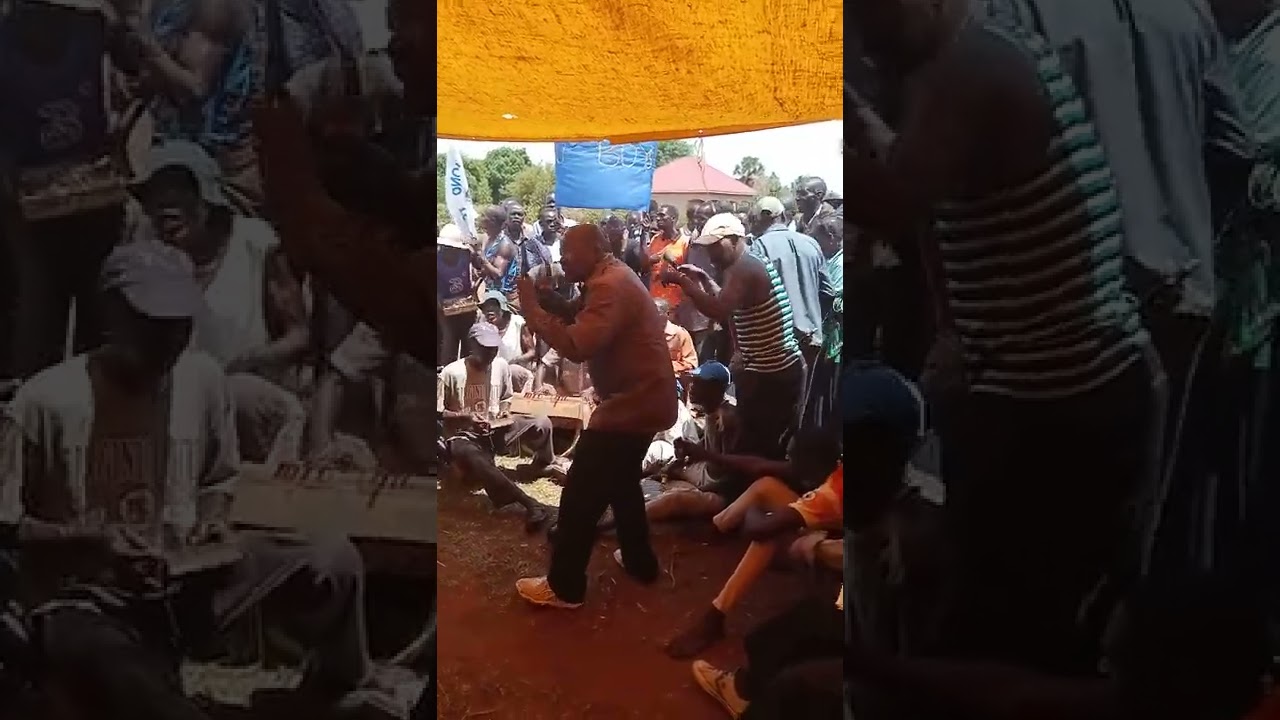 lango caltural music men okeme - YouTube