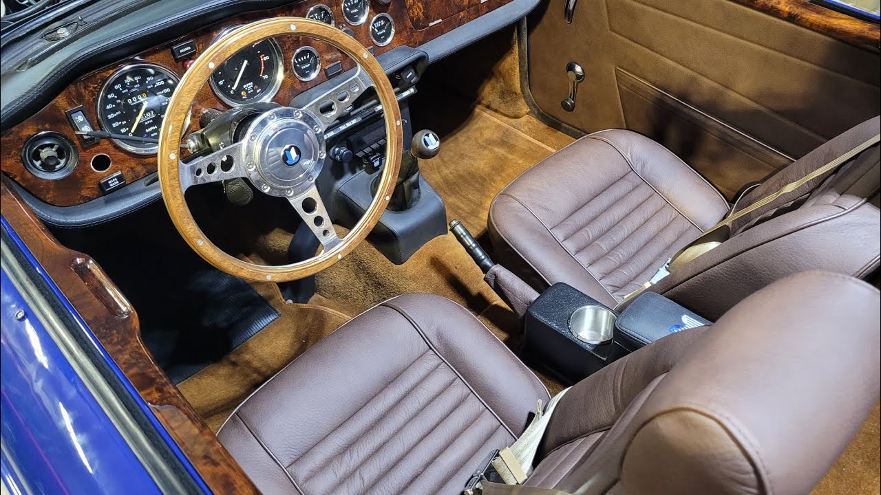 1974 Delph Blue Tr6 assembly part 16 (fitting the soft top) - YouTube