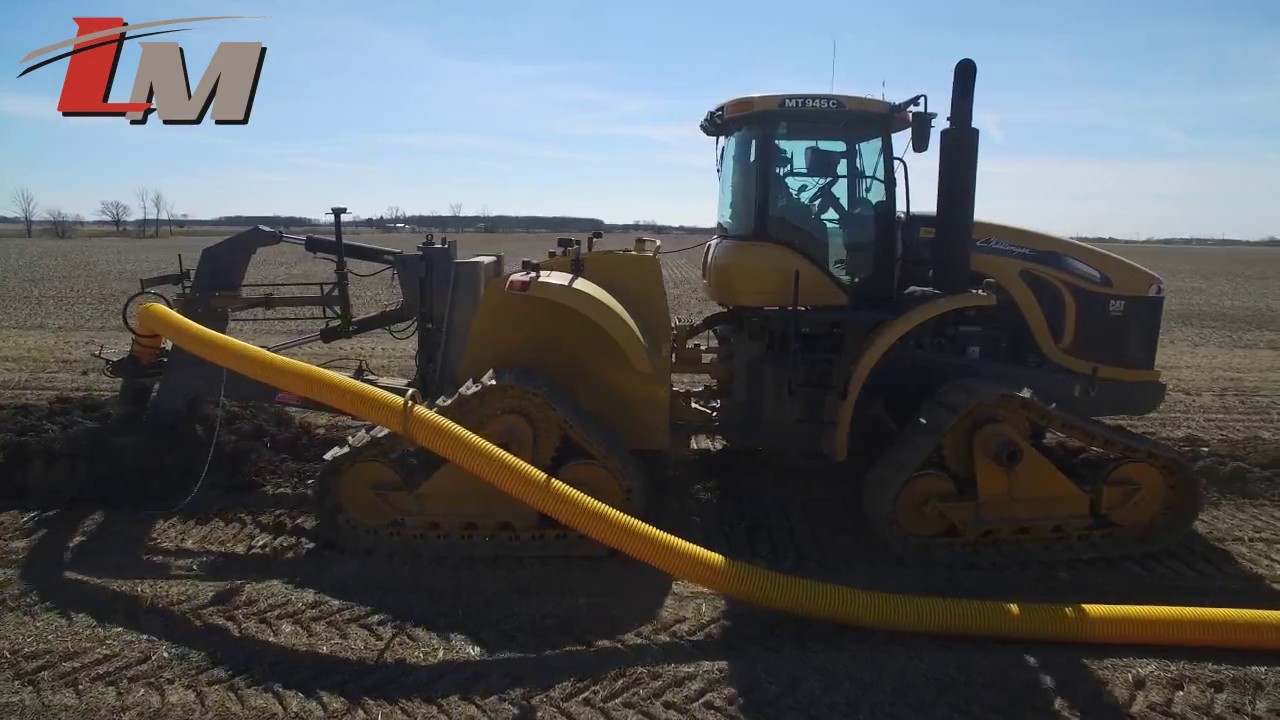 CAT with Steel Tracks on Liebrecht Mounted Tile Plow - Spring 2018 ...