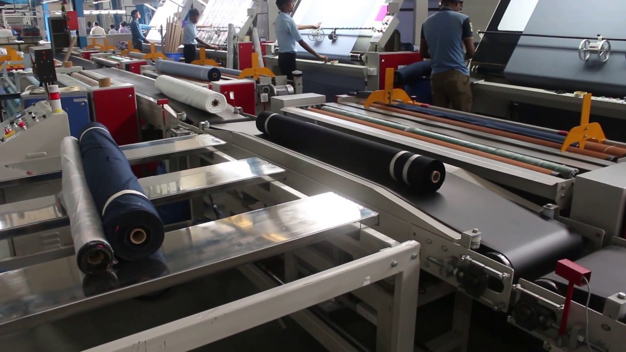 FABRIC ROLL CONVEYOR SYSTEM WITH DOFFING & WEIGHING - YouTube