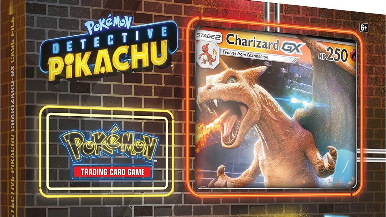 Opening up the detective pickachu charizard gx box - YouTube